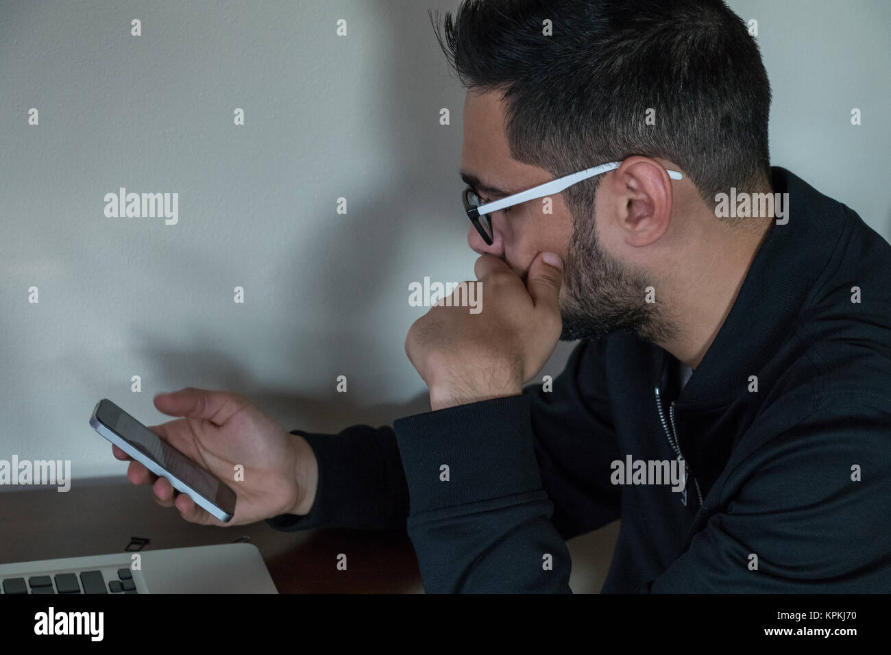 Young business man multitasking Stock Photo - Alamy