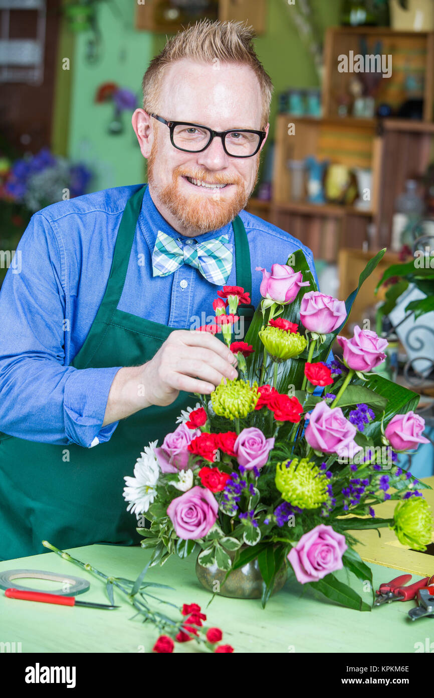 Handsome Man Working in Flower Shop Stock Photo - Alamy