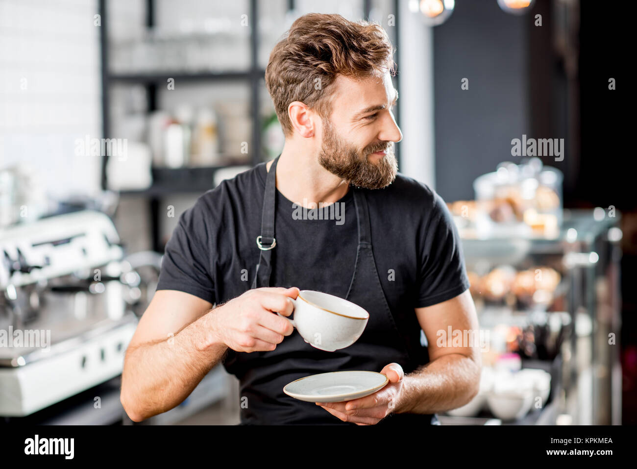 Handsome barista drinking cup hi-res stock photography and images - Alamy