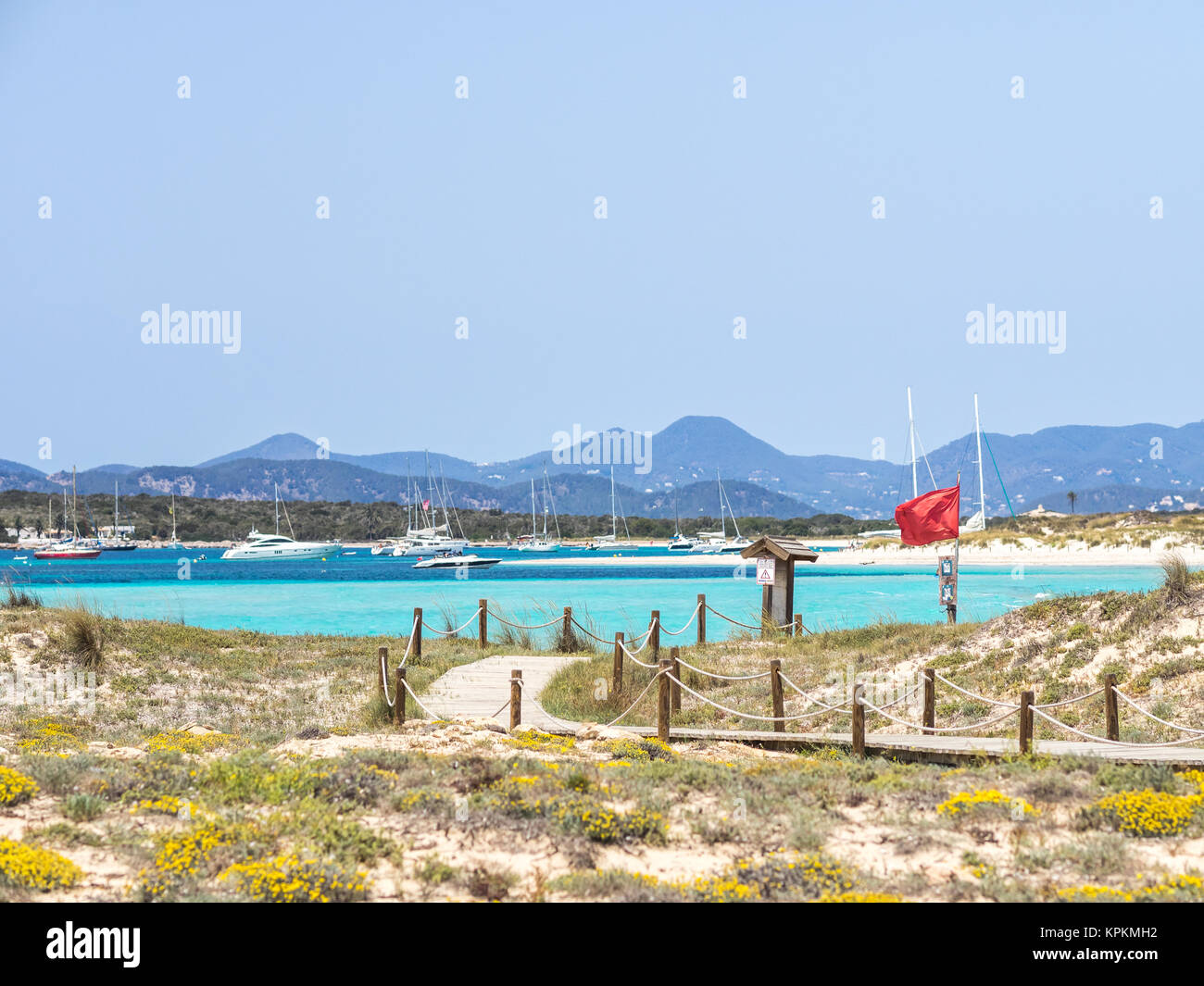 Red flag on Ses illetes beach, Formentera (text translation: Do not ...
