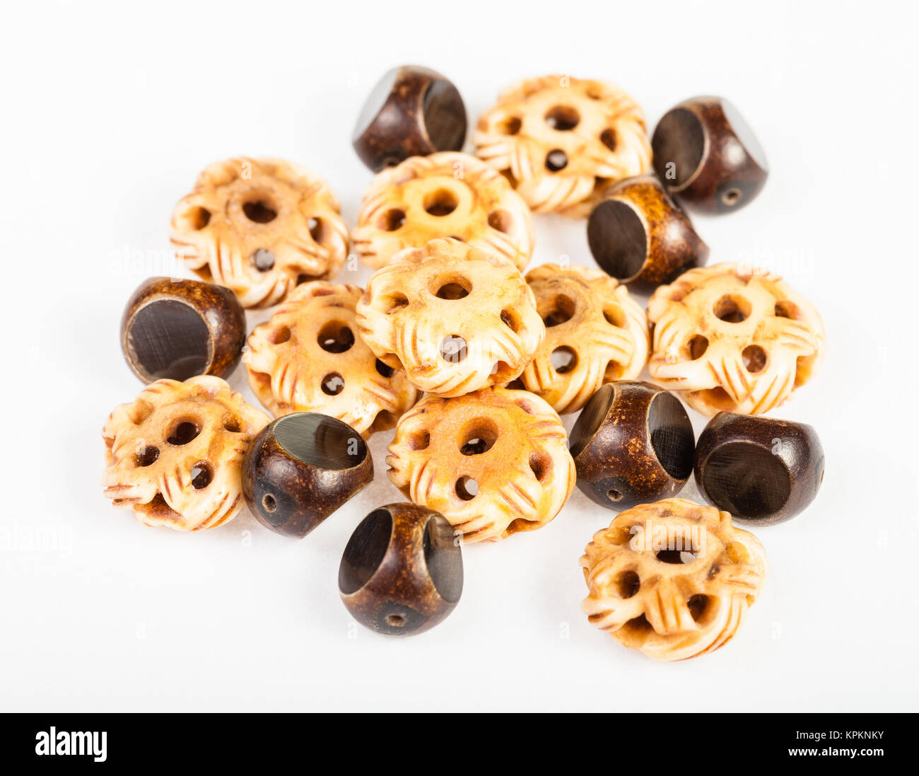 many beads from carved bone Stock Photo - Alamy