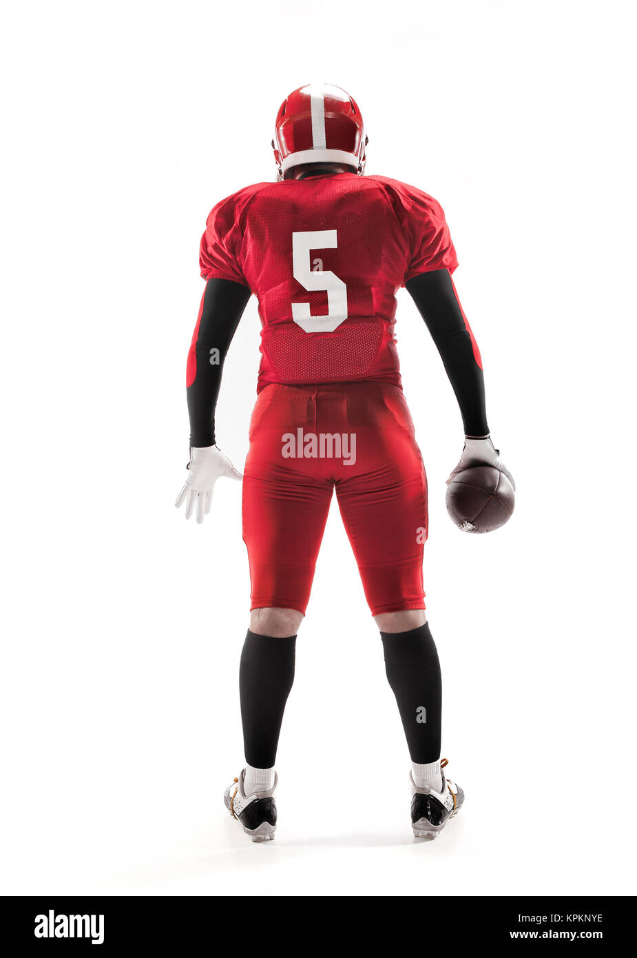 American football player posing with ball on white background Stock ...