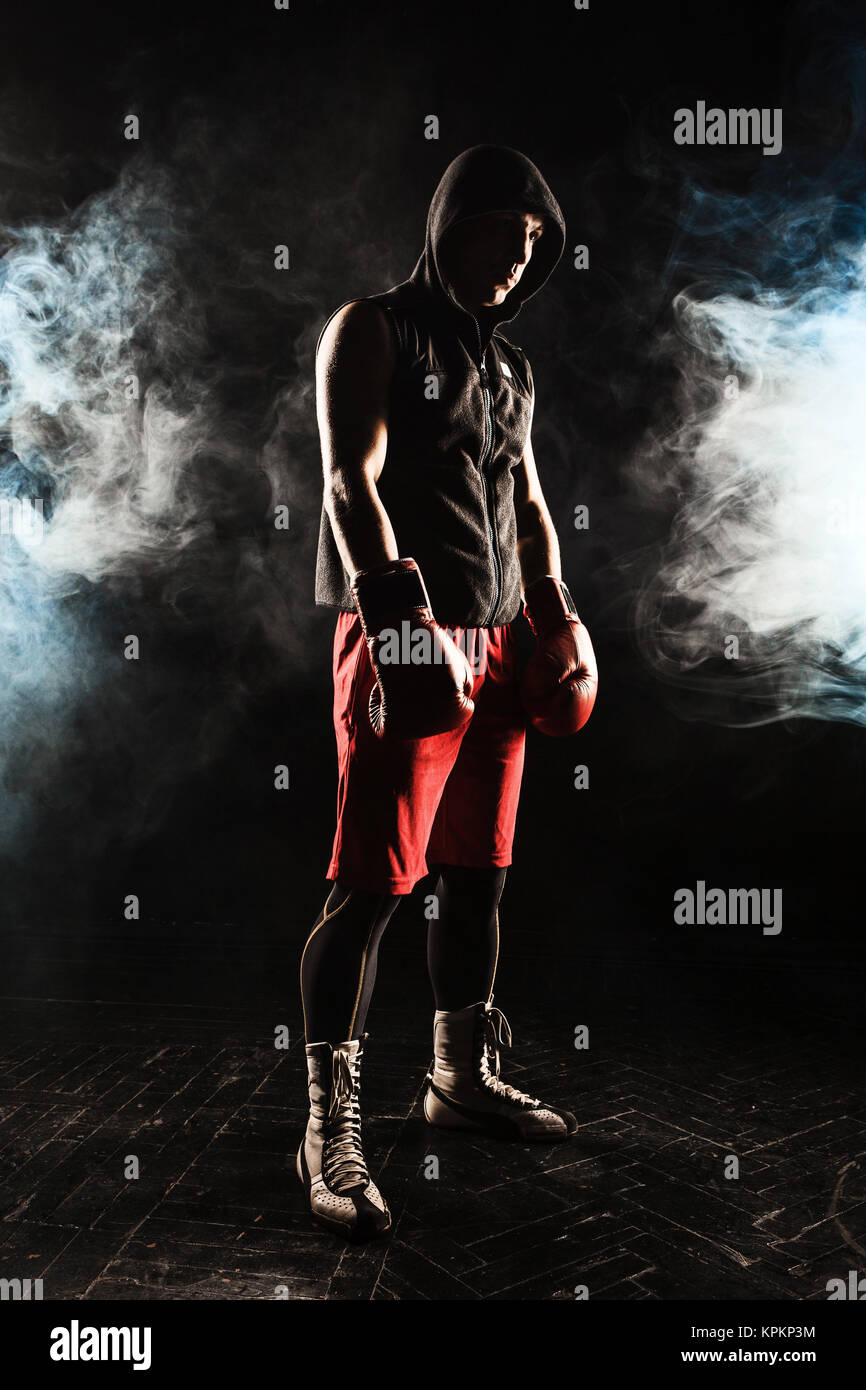 The young man kickboxing Stock Photo - Alamy
