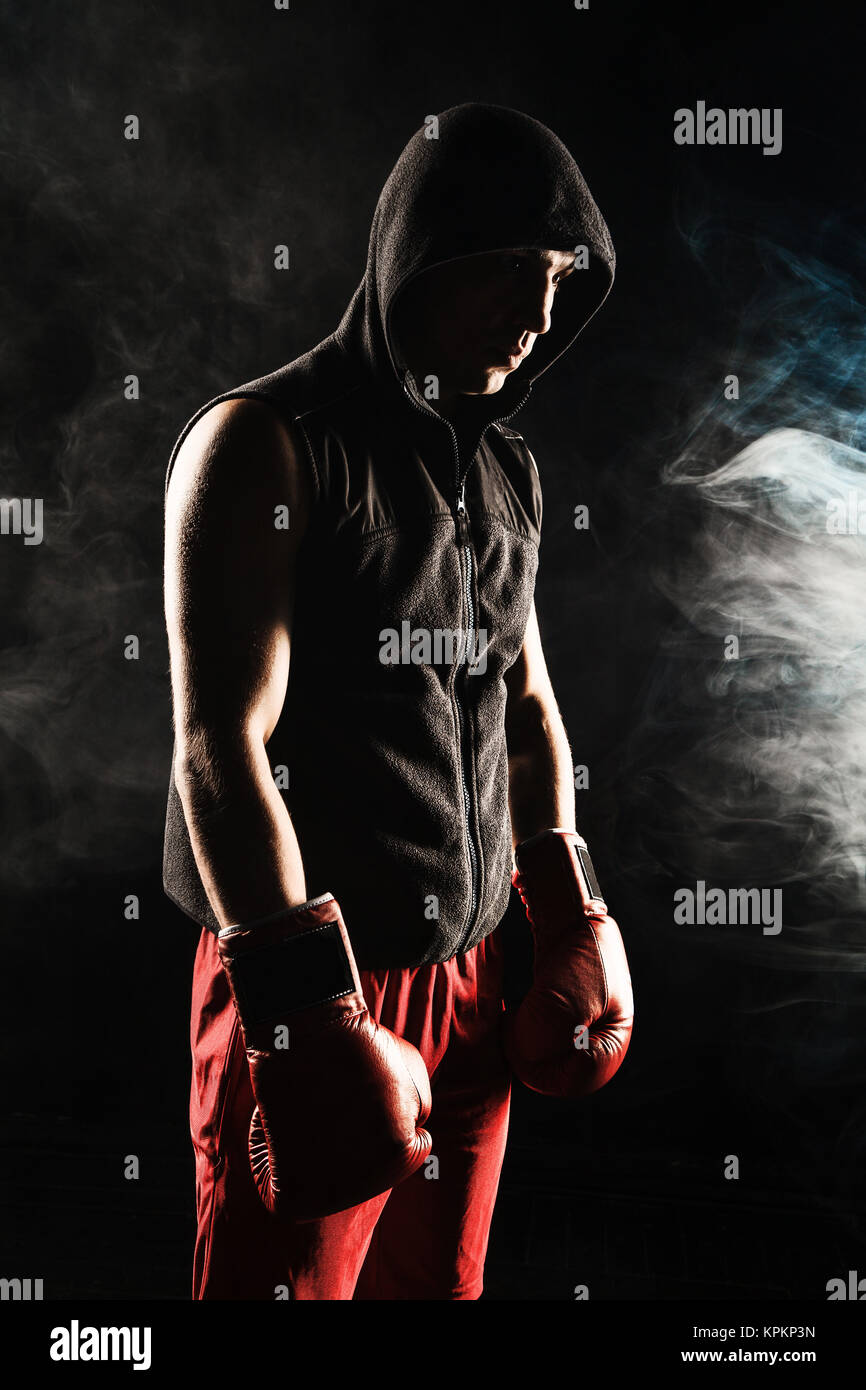 The young man kickboxing Stock Photo - Alamy