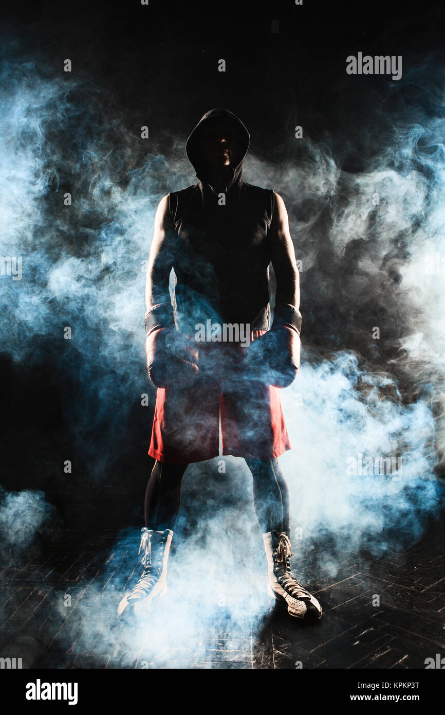 The young man kickboxing Stock Photo - Alamy