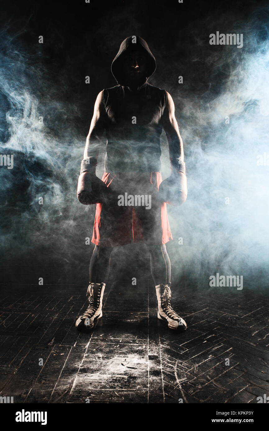 The young man kickboxing Stock Photo - Alamy