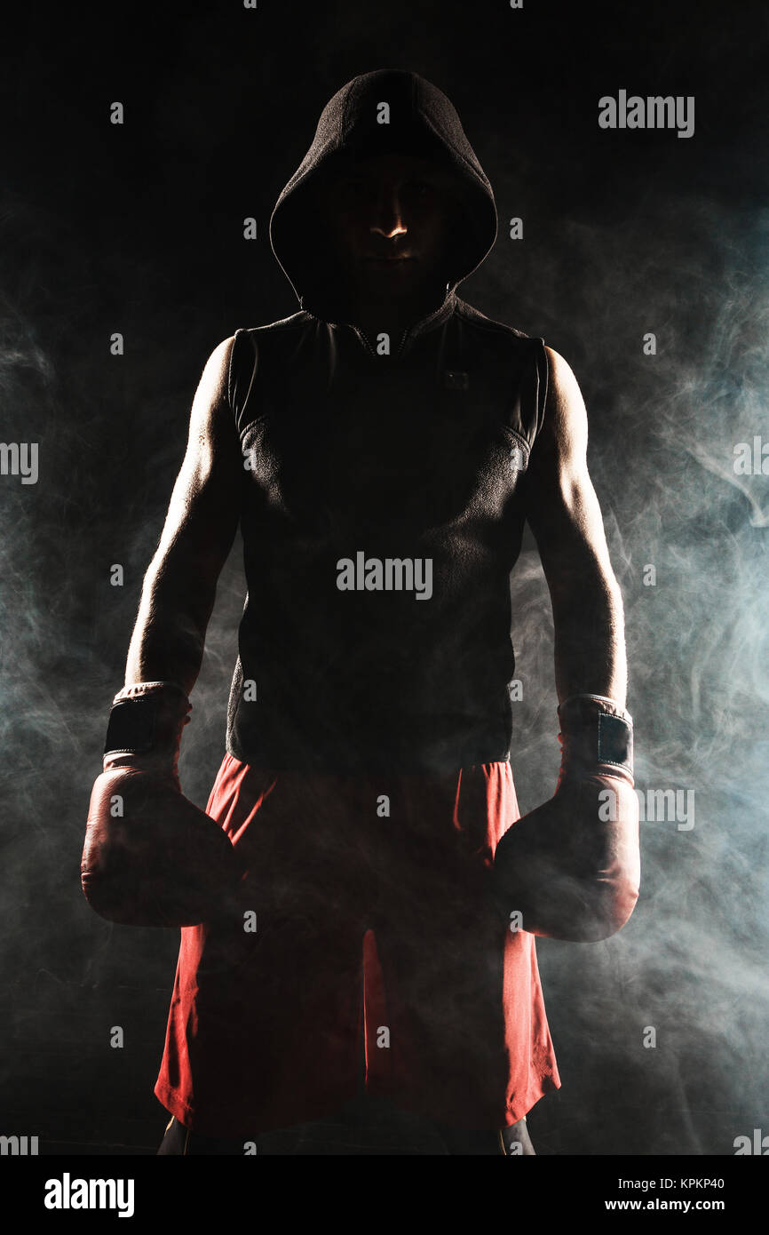 The young man kickboxing Stock Photo - Alamy