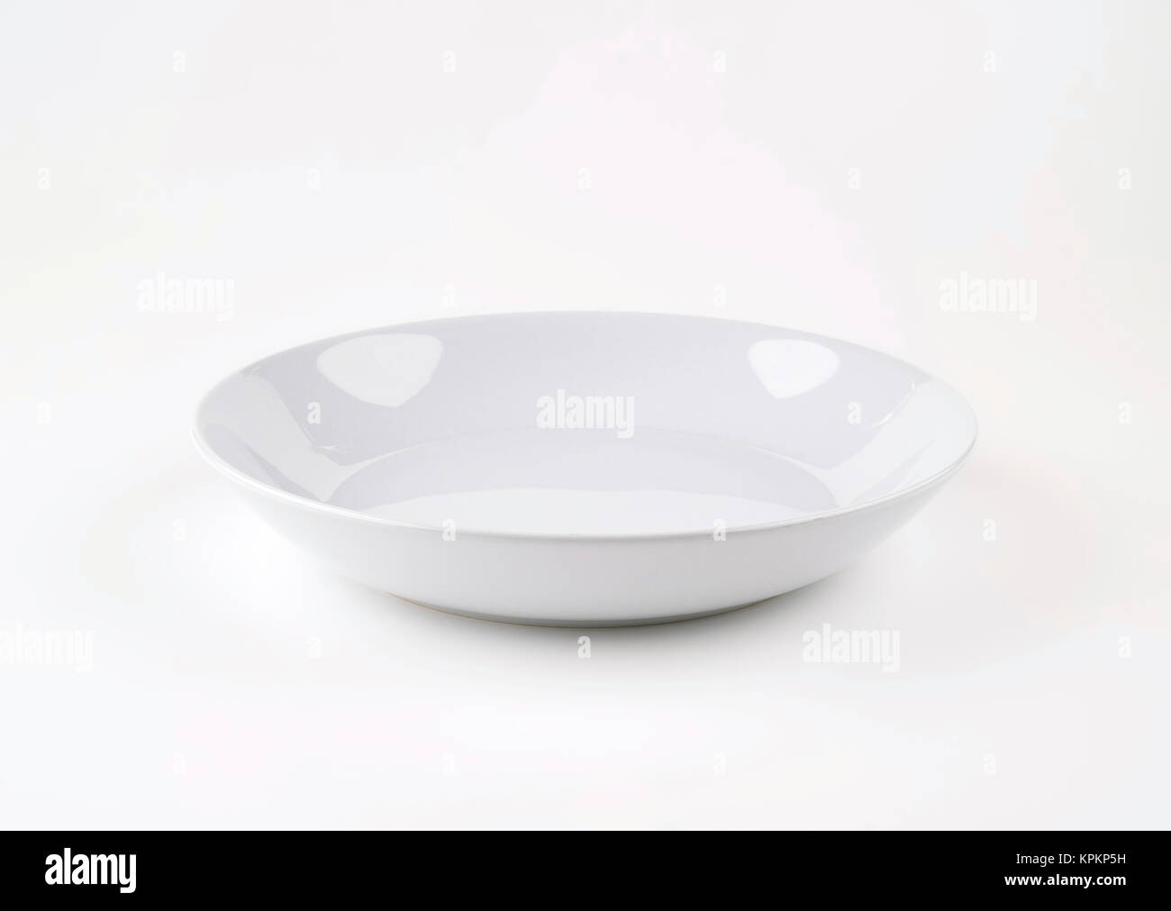 coupe shaped deep plate Stock Photo - Alamy