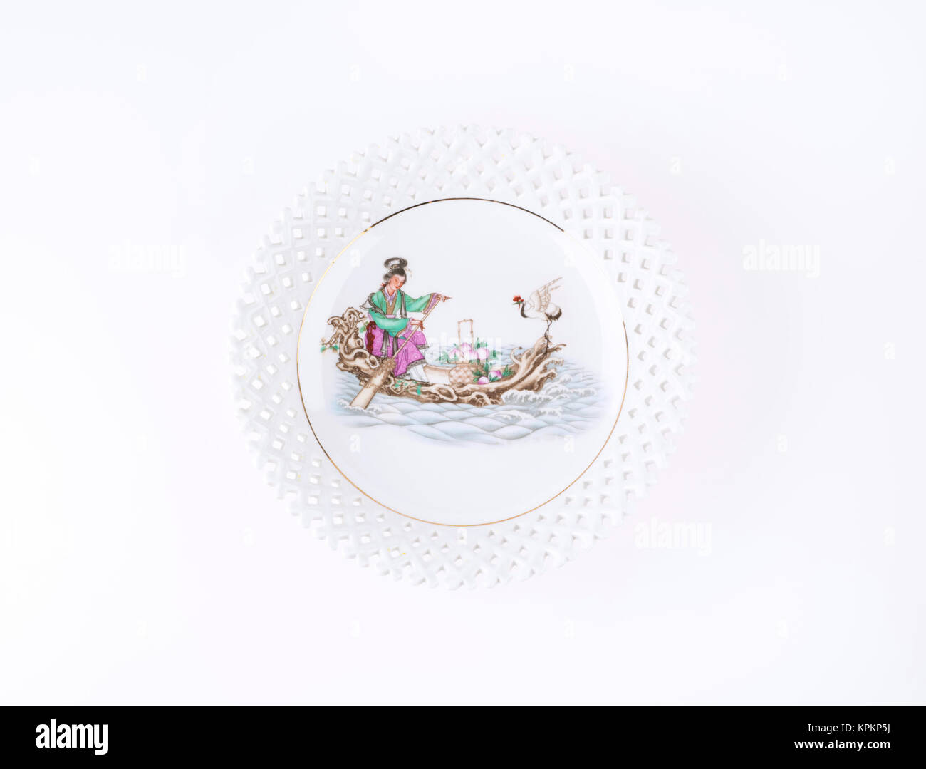 Porcelain plate with lattice edge Stock Photo - Alamy