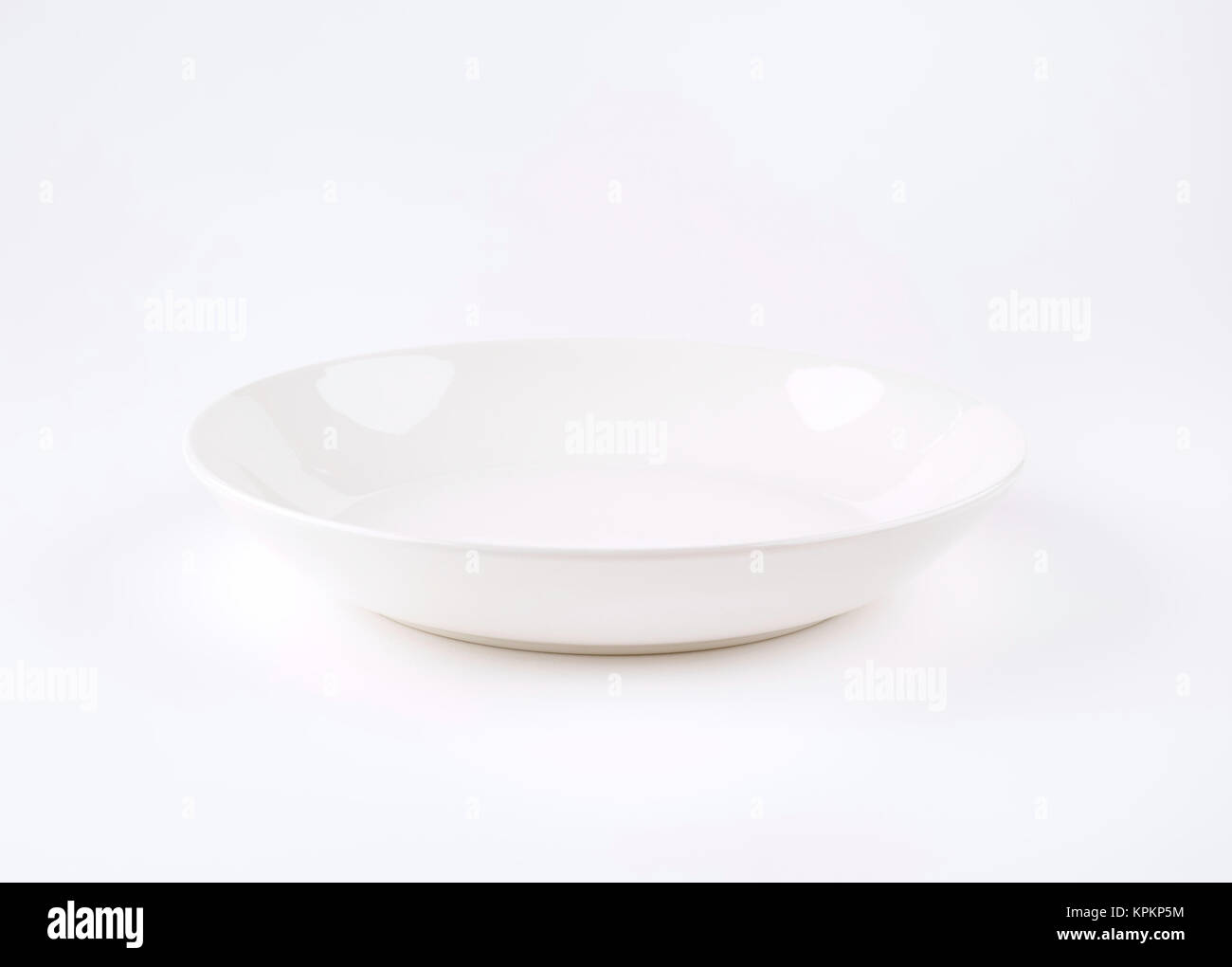coupe shaped deep plate Stock Photo - Alamy