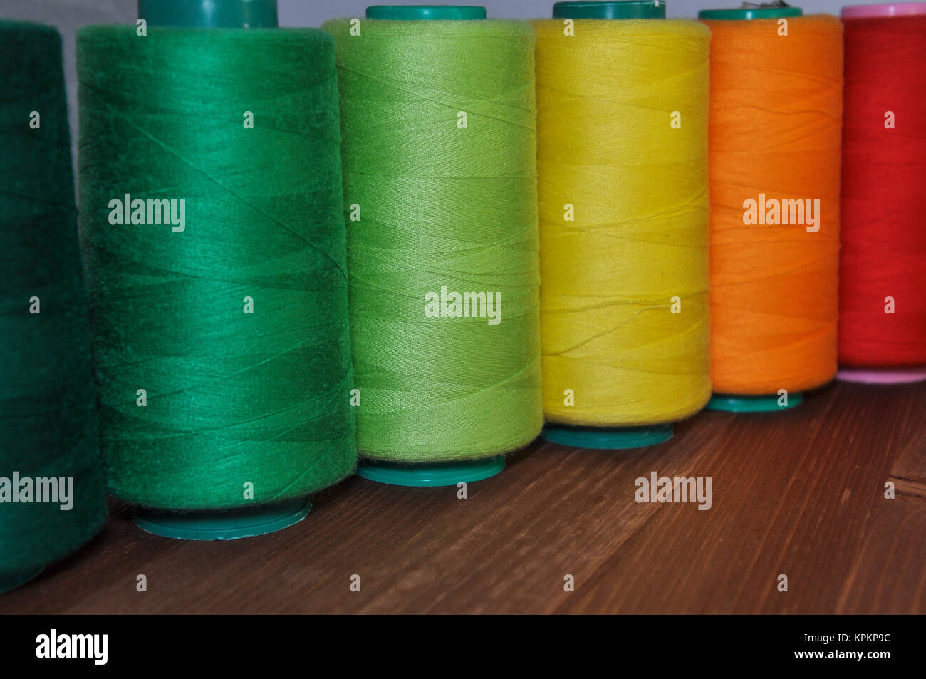 Red, Green, Yellow And Orange Thread Stock Photo - Alamy
