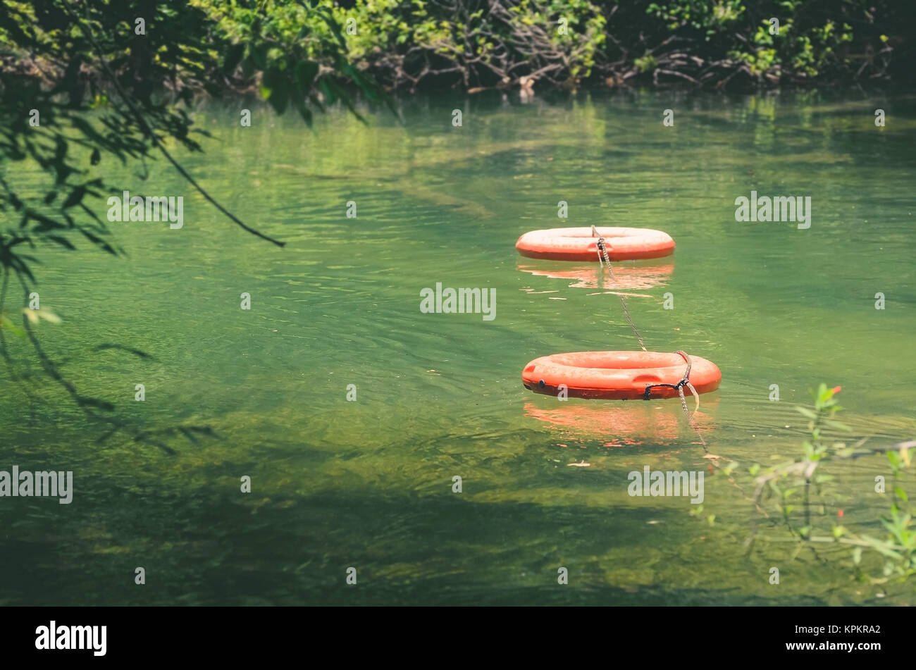 Life buoys floating on waters of Formoso river, a river with ...