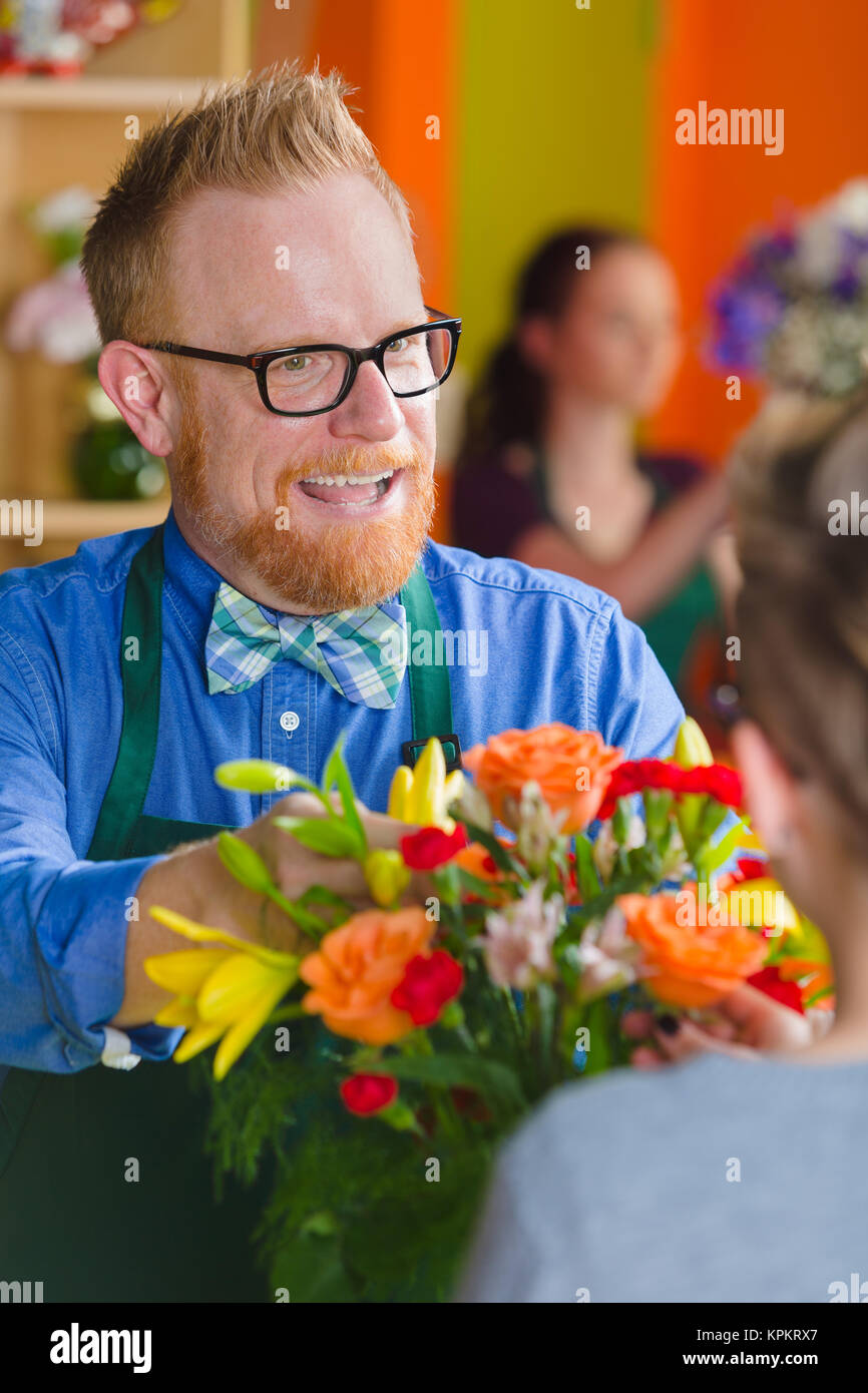 Friendly Flower Shop Owner and Customer Stock Photo - Alamy