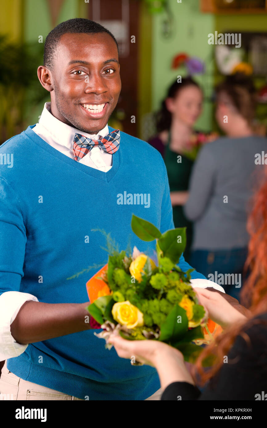 Flower Shop Customer Receiving Bouquet Stock Photo - Alamy