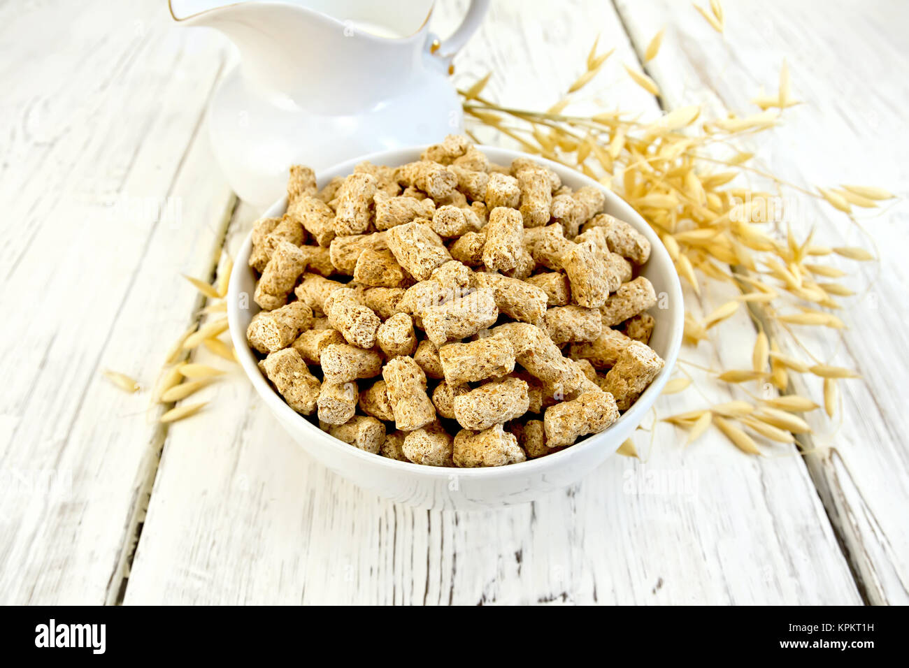 Bran in bowl on board Stock Photo - Alamy