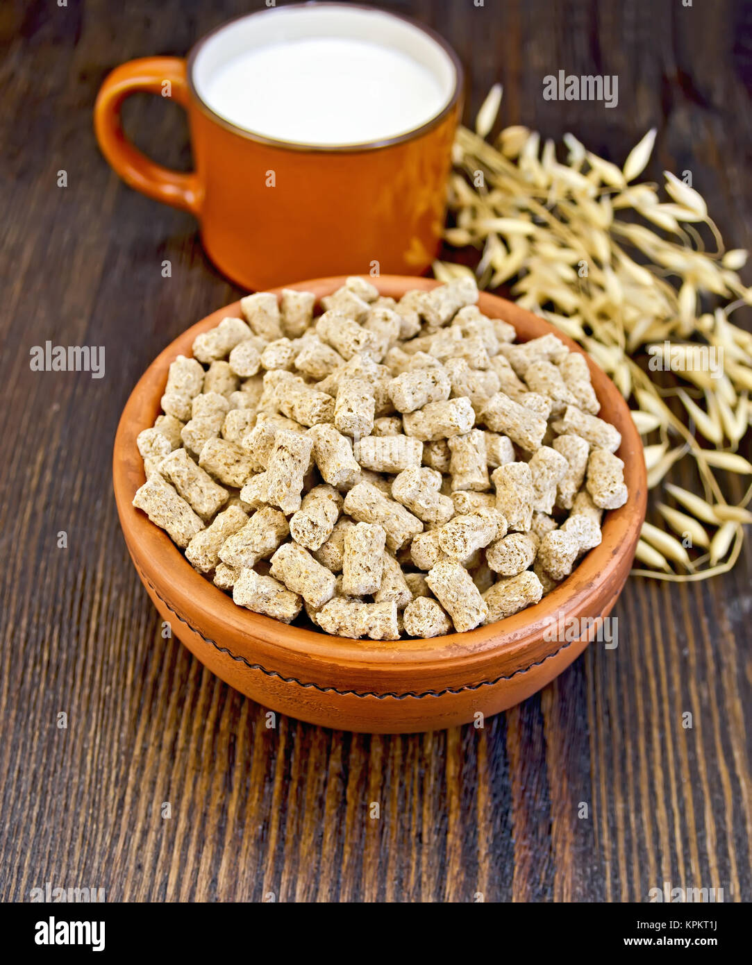 Bran in bowl on dark board Stock Photo - Alamy