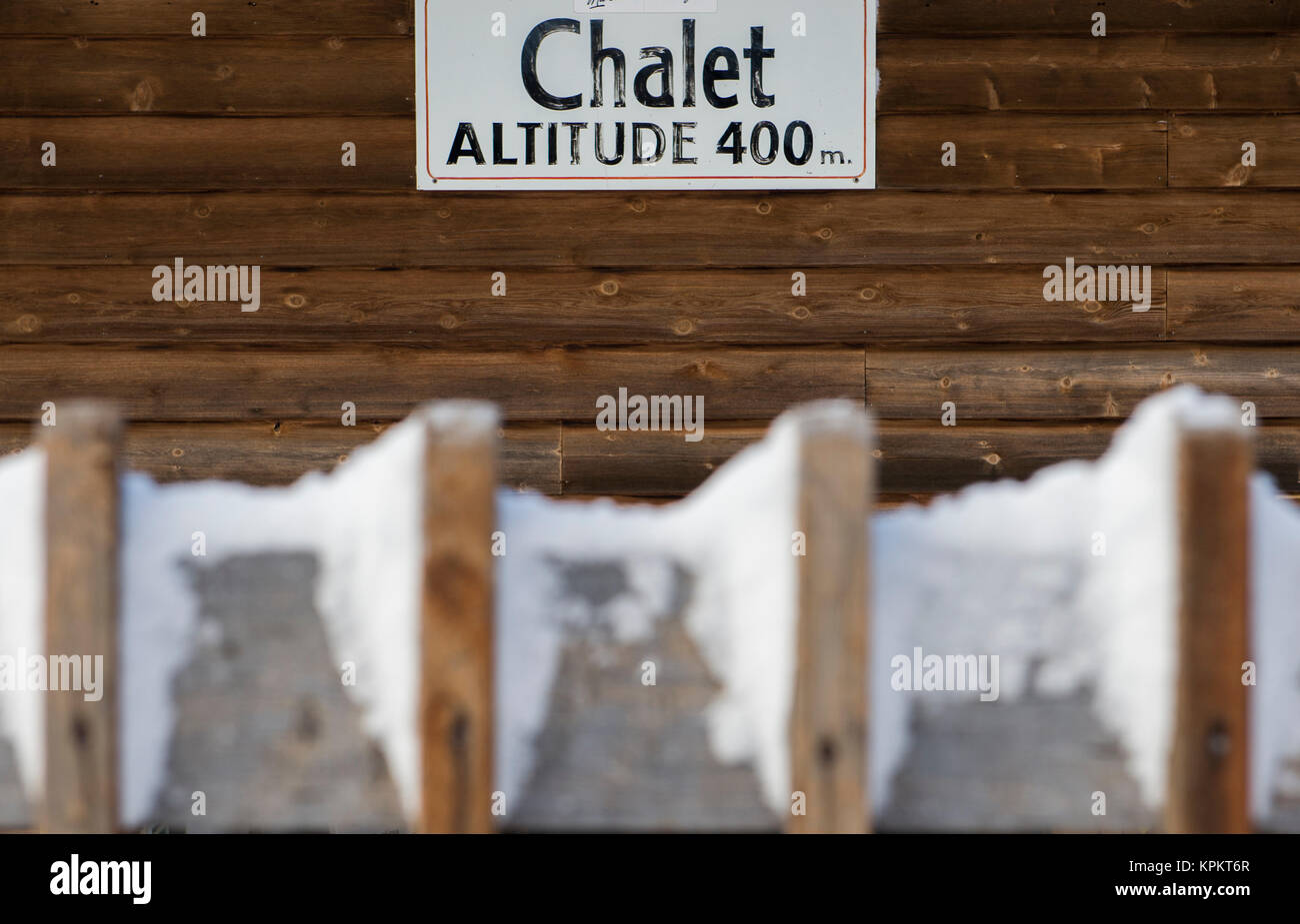 A chalet and altitude sign is shown Stock Photo - Alamy