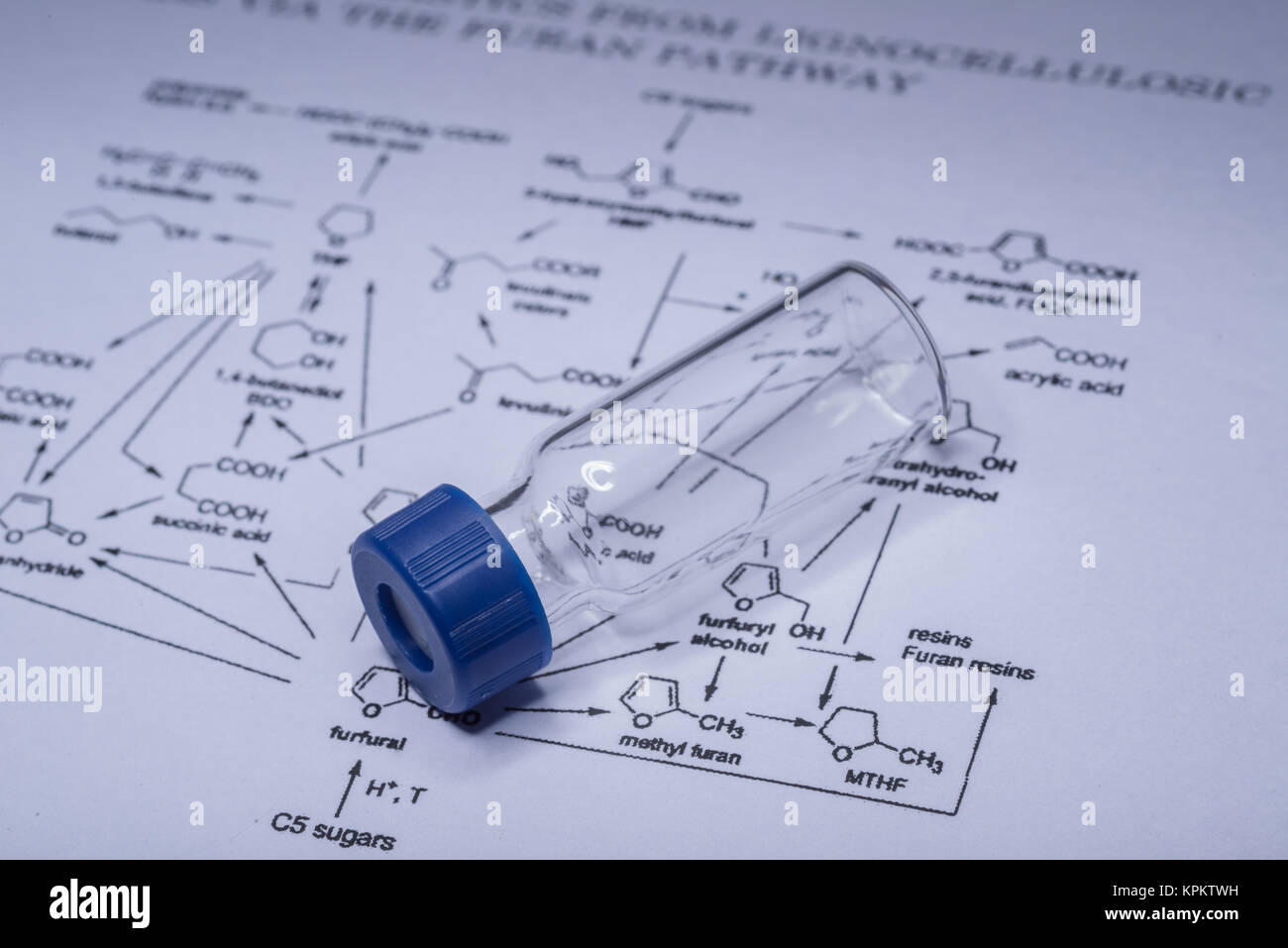 Sample vial on the paper Stock Photo - Alamy