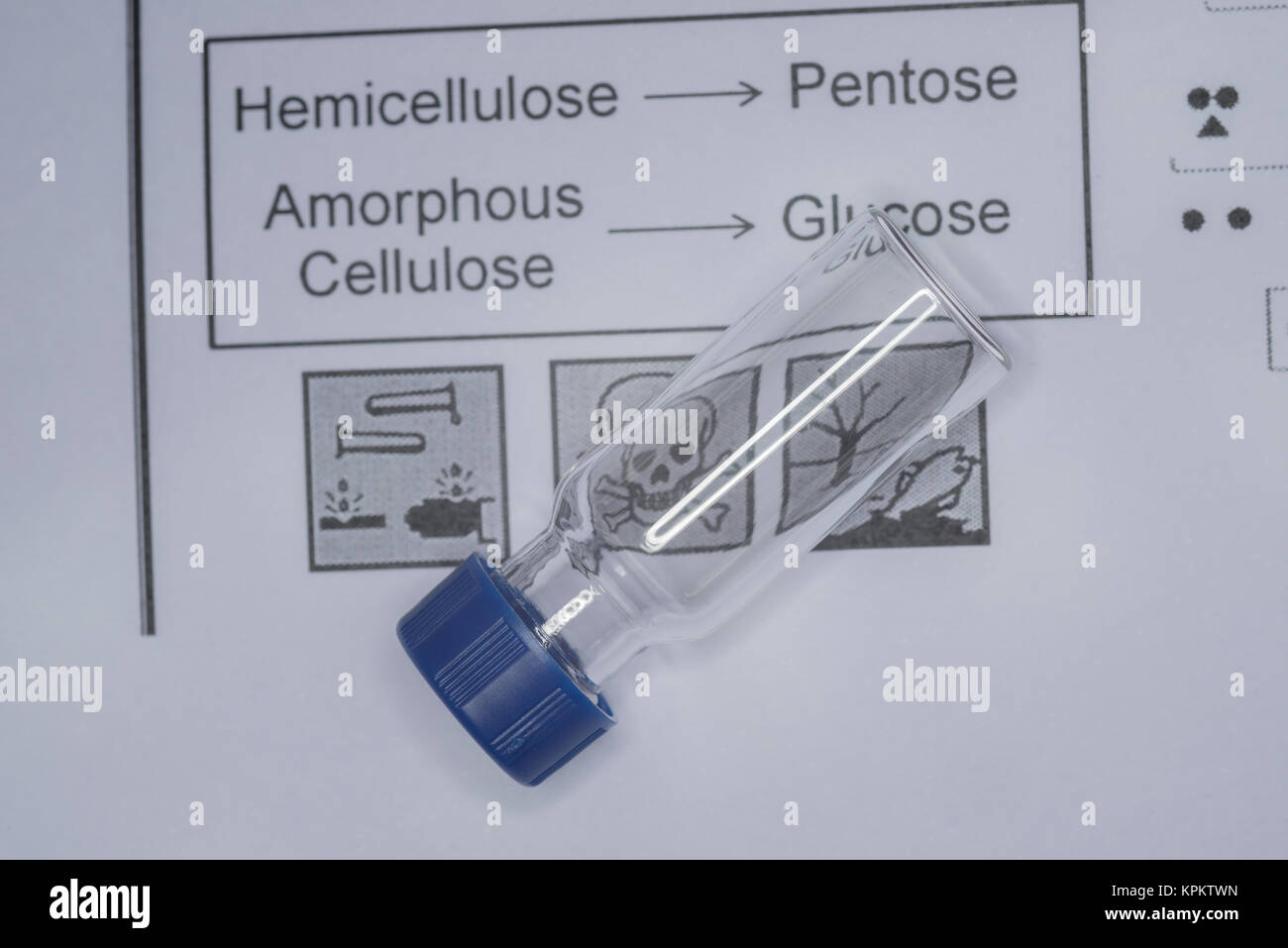 Sample vial on the paper Stock Photo - Alamy