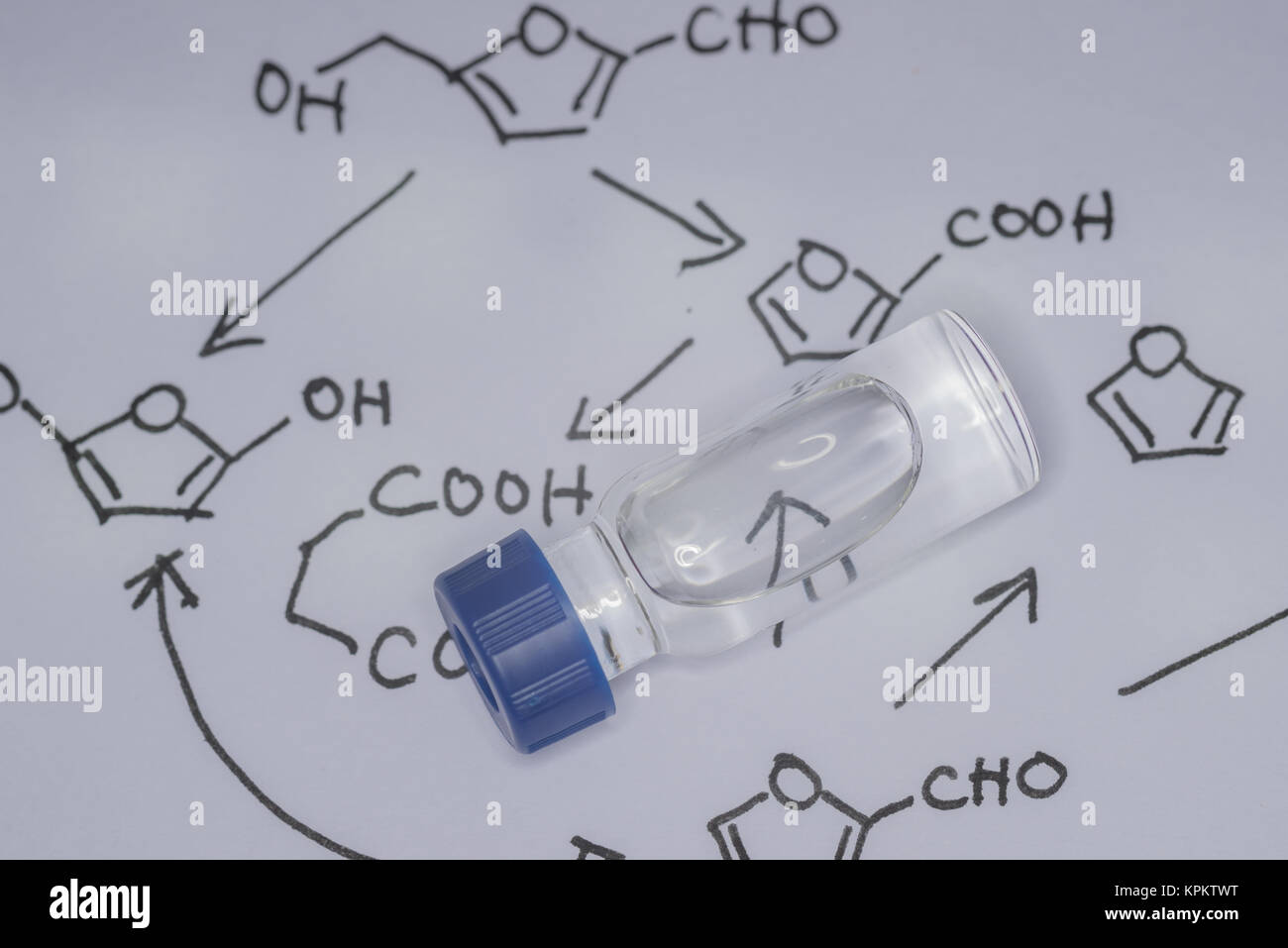 Sample vial on the paper Stock Photo - Alamy