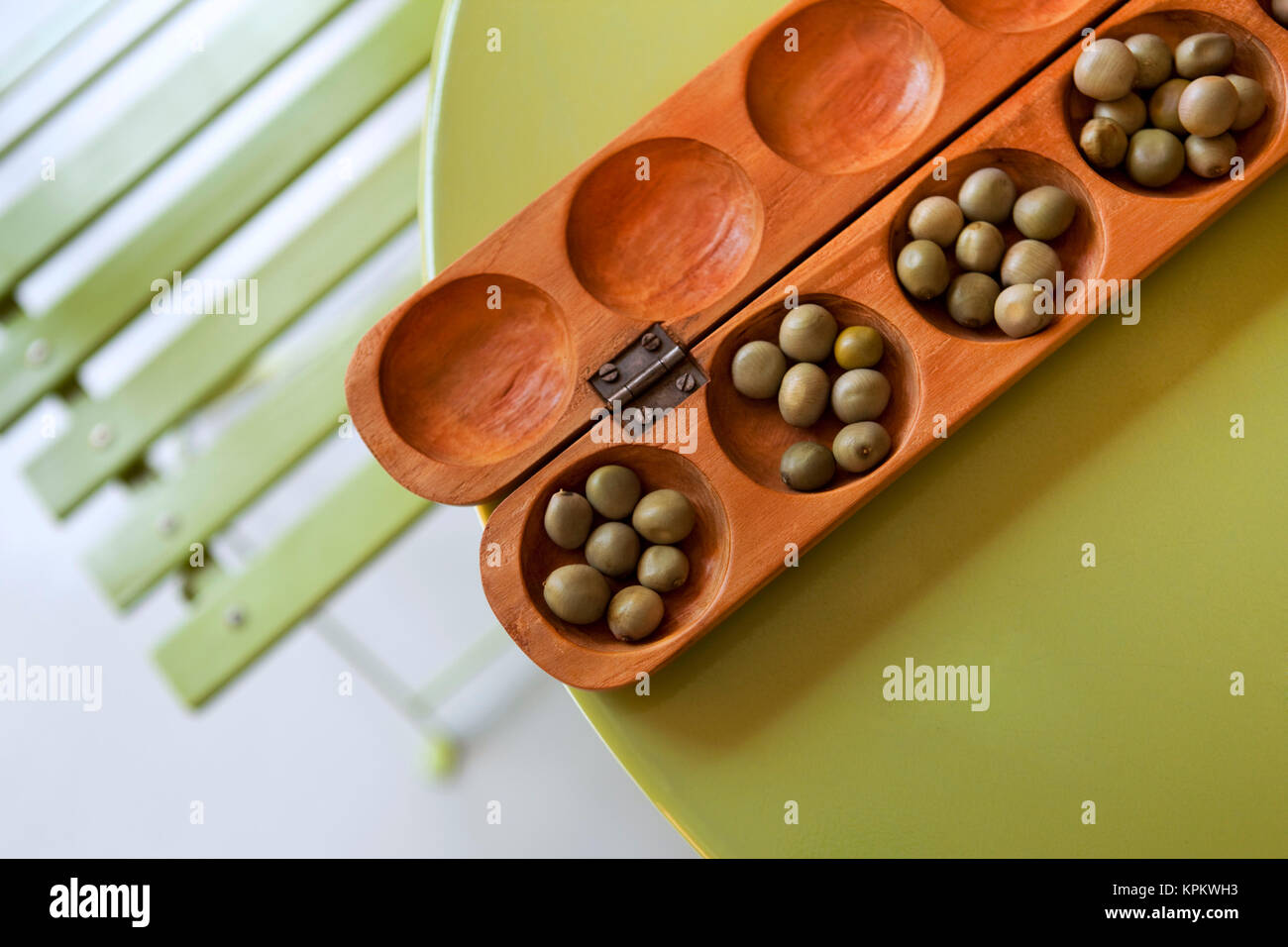 Wooden game awale Stock Photo - Alamy