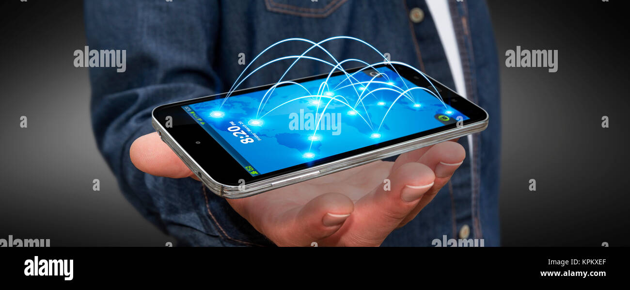 Young man using modern mobile phone Stock Photo - Alamy