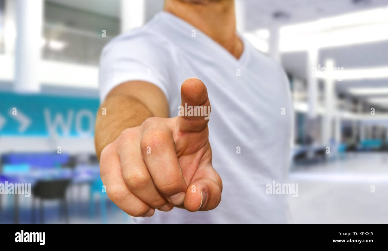 Young man pointing finger Stock Photo - Alamy Young man pointing finger Stock Photo - Alamy