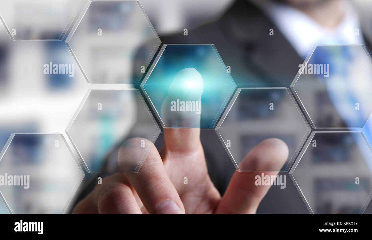 Businessman in his office using tactile interface Stock Photo - Alamy