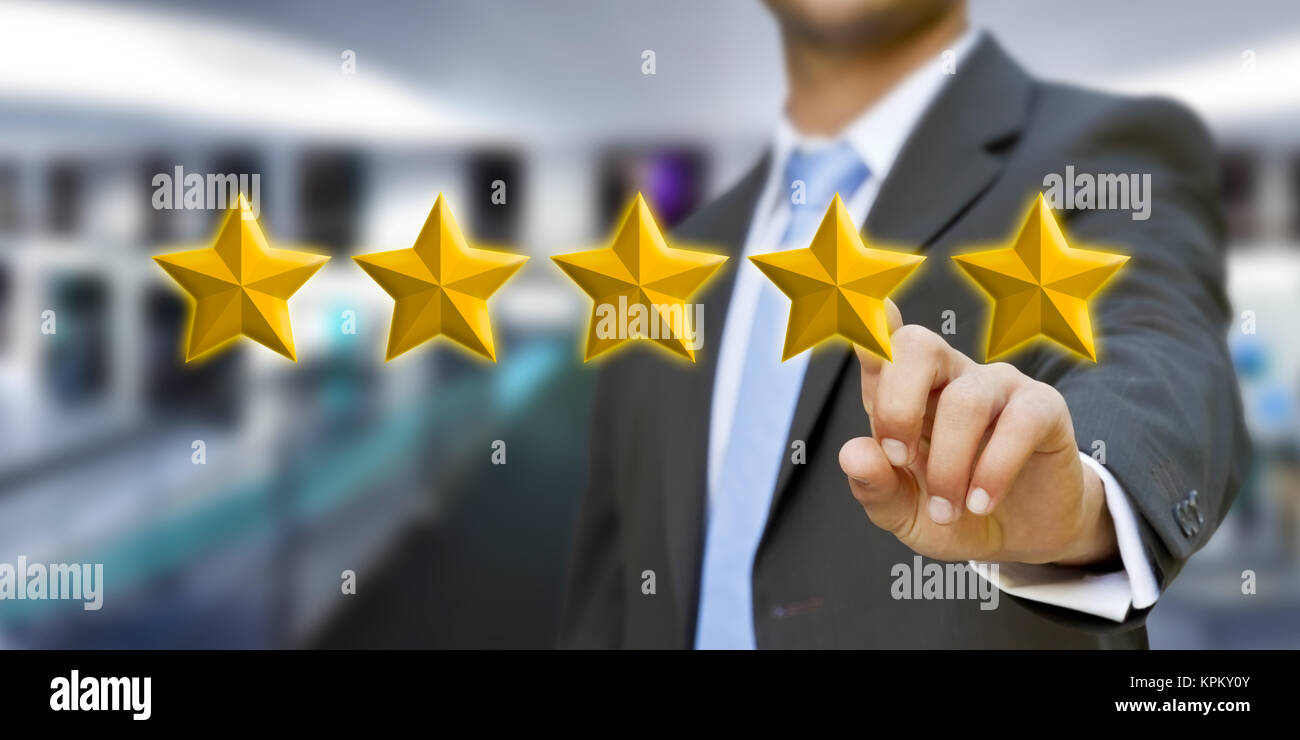 Young man rating stars Stock Photo - Alamy