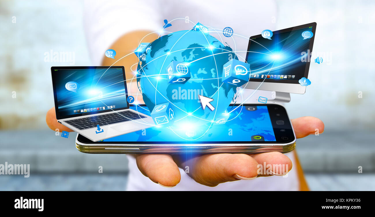 Businessman connecting tech devices Stock Photo - Alamy