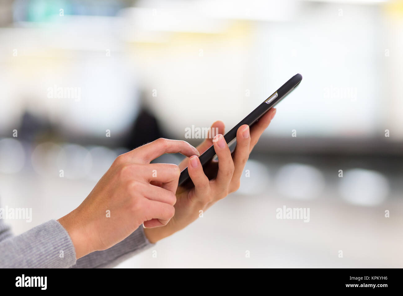 Woman finger touch on cellphone Stock Photo - Alamy
