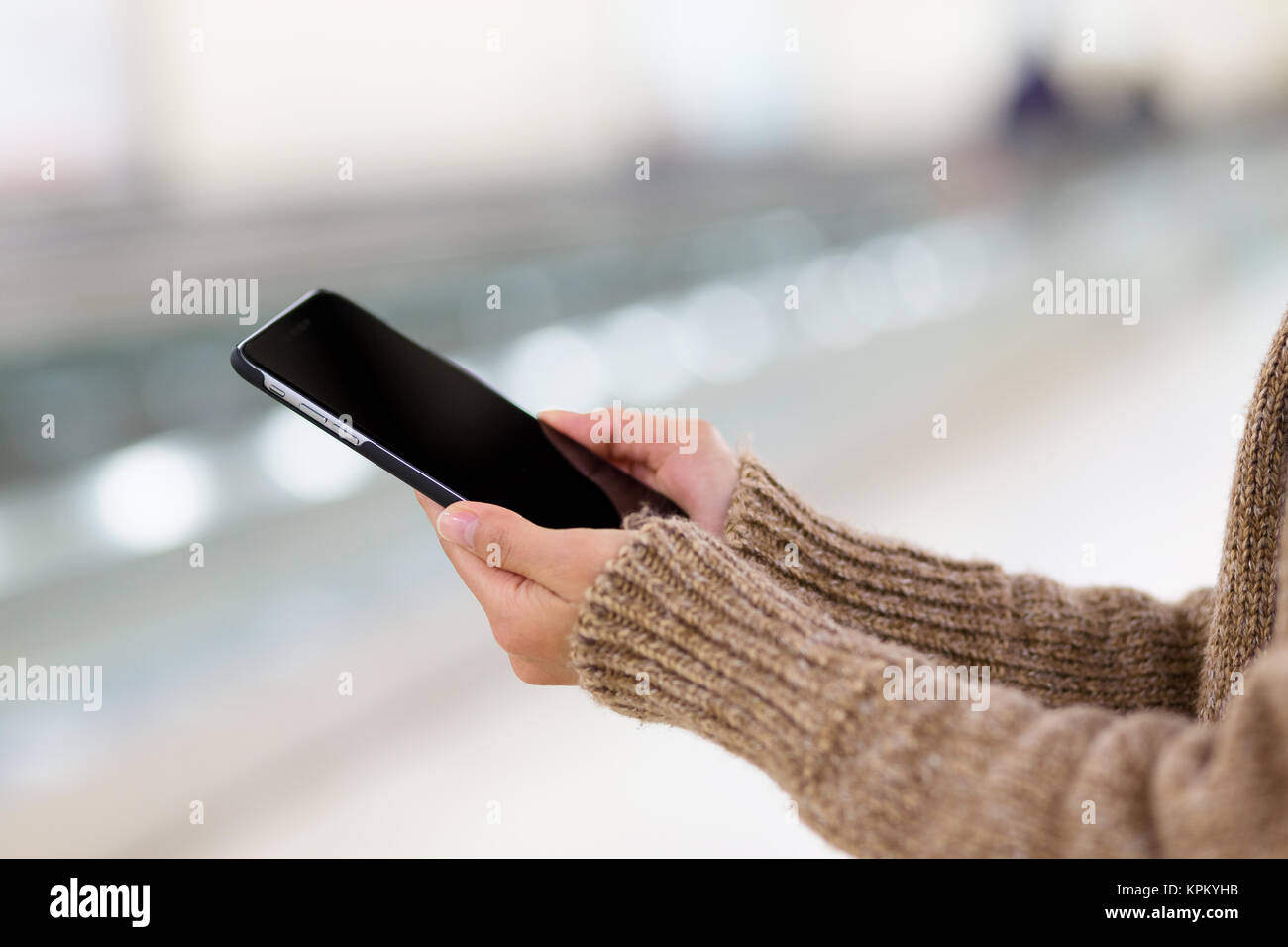 Woman touch on screen of mobile phone Stock Photo - Alamy