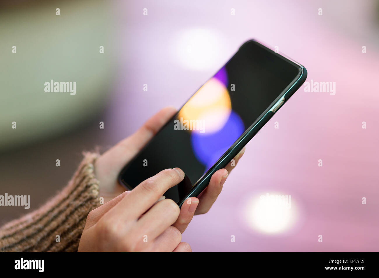 Woman touch on screen of mobile phone Stock Photo - Alamy