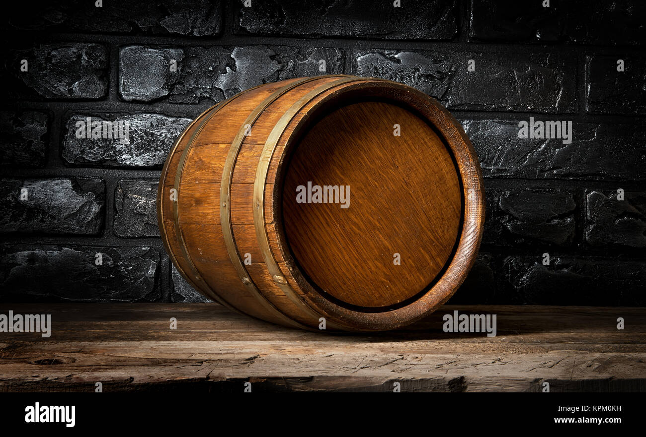 Brick wall and barrel Stock Photo - Alamy