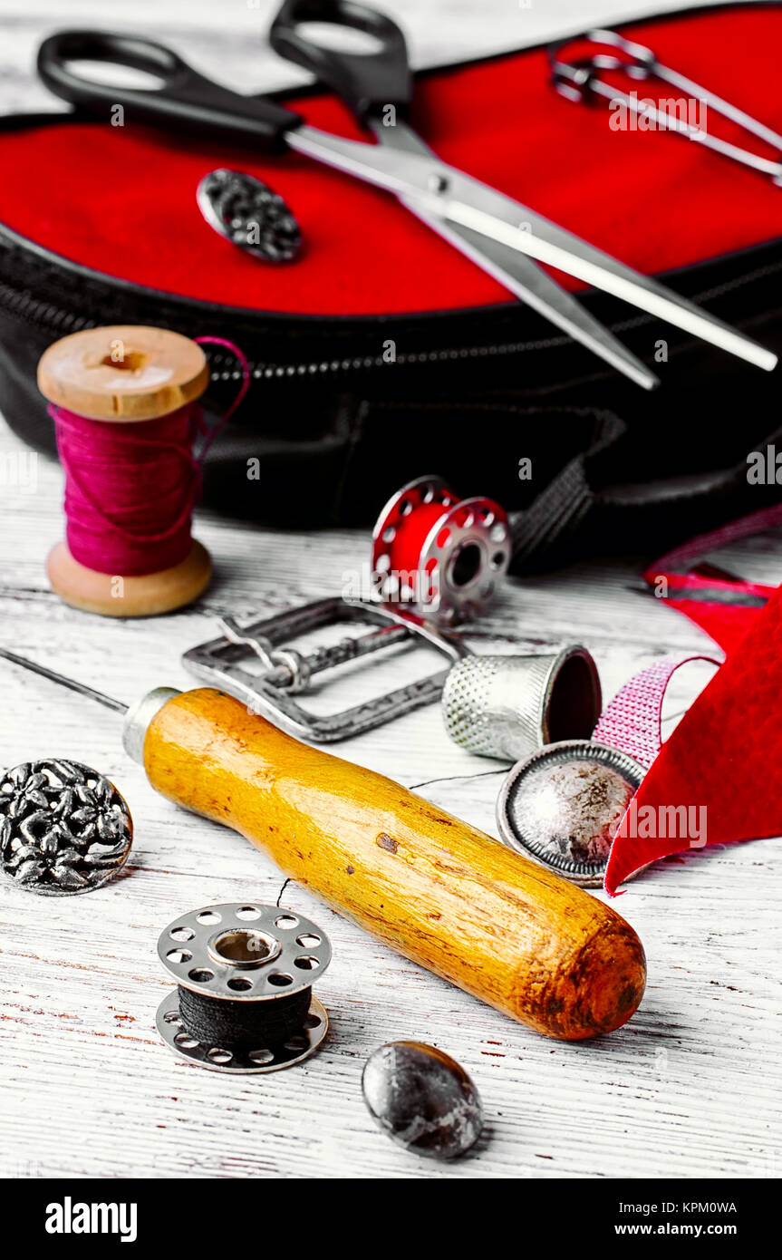 Sewing tool for needlework and leather scraps Stock Photo - Alamy