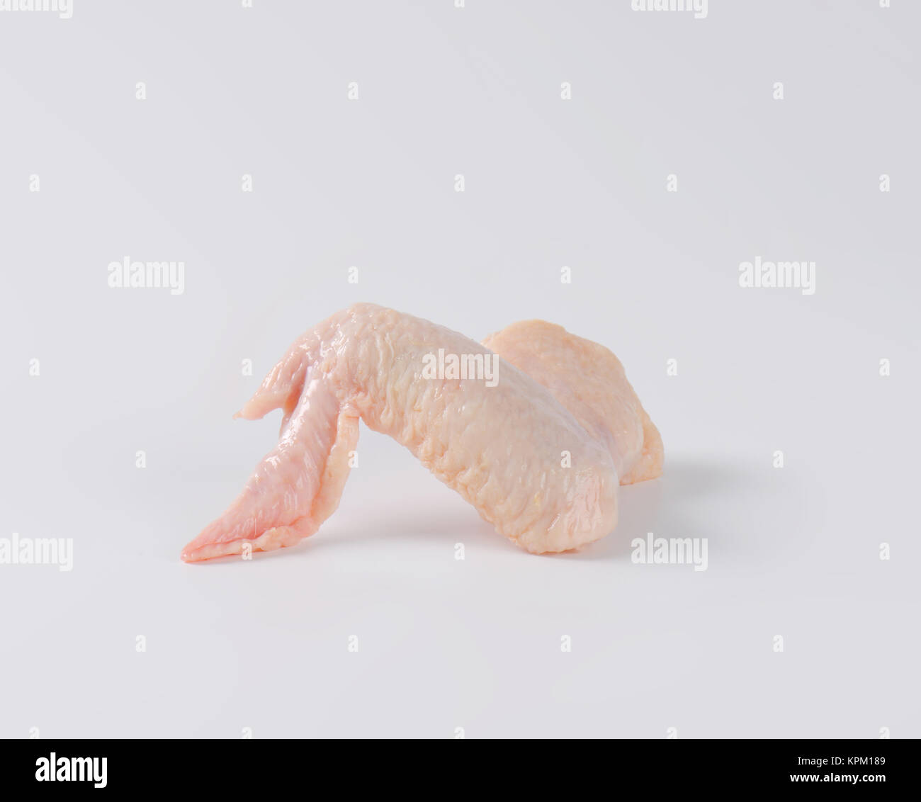 single raw chicken wing Stock Photo - Alamy