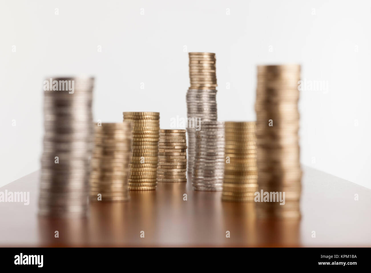 coin stacks focus on fourth stack Stock Photo - Alamy