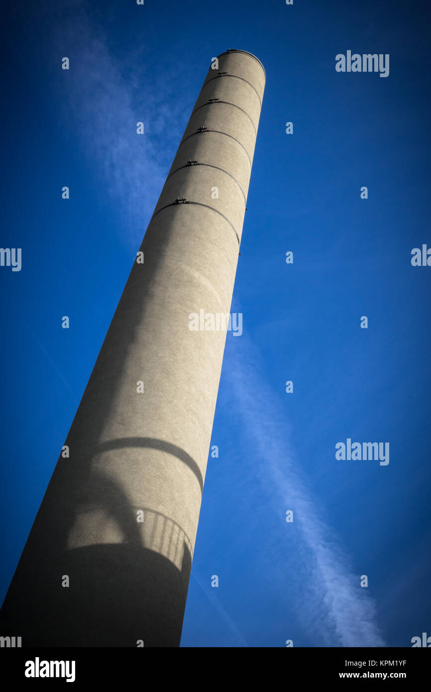 Chimney against blue sky Stock Photo - Alamy