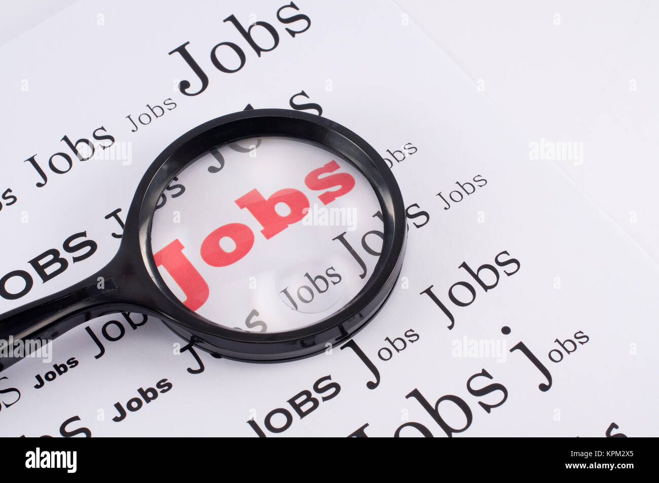 Job search concept with magnifying glass highlighting the word Job ...