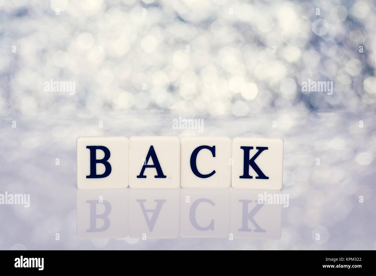 Written word of tiles with letters - back Stock Photo - Alamy