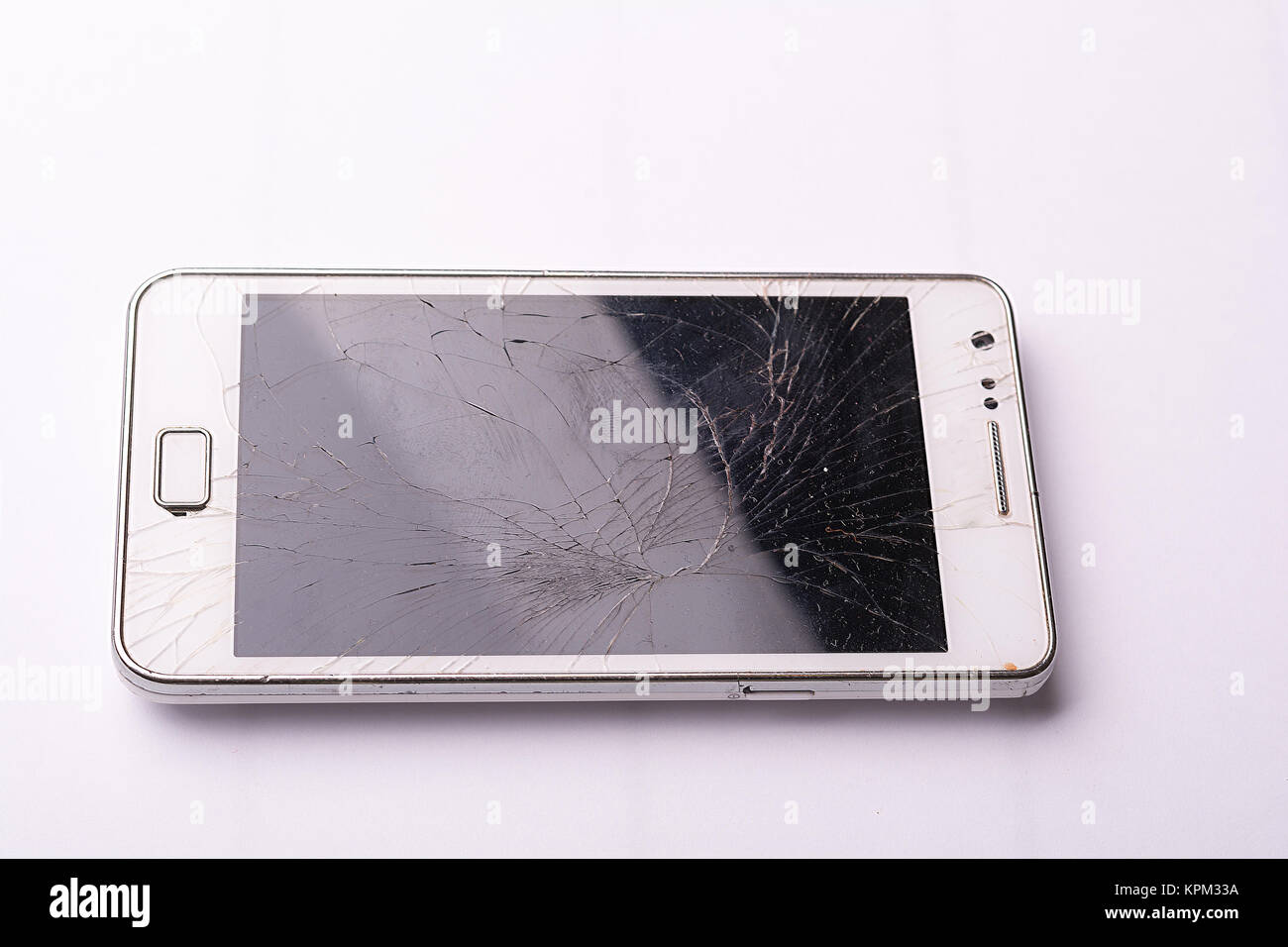 Smartphone drop to the floor and screen damage broken on white ...