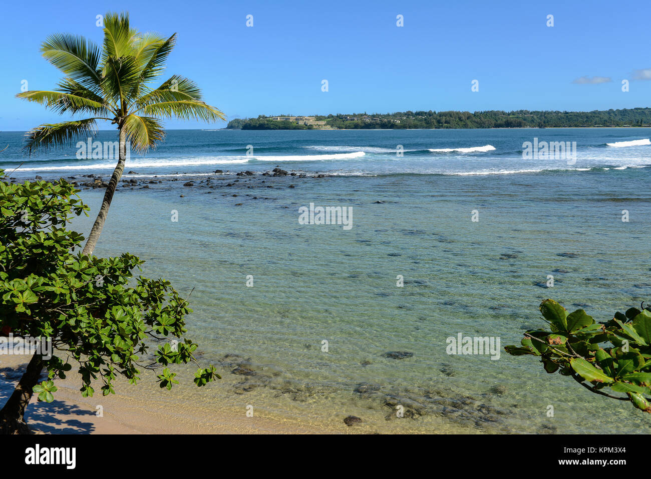 Tropical Coast - View of a hideaway beach and crystal-clear lagoon at ...