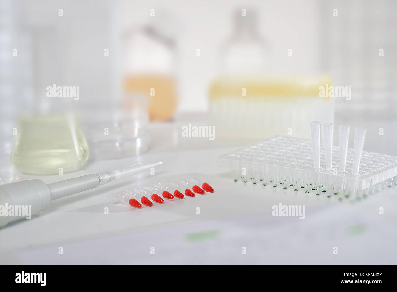 Scientific background with PCR tubes for DNA analysis, automatic ...