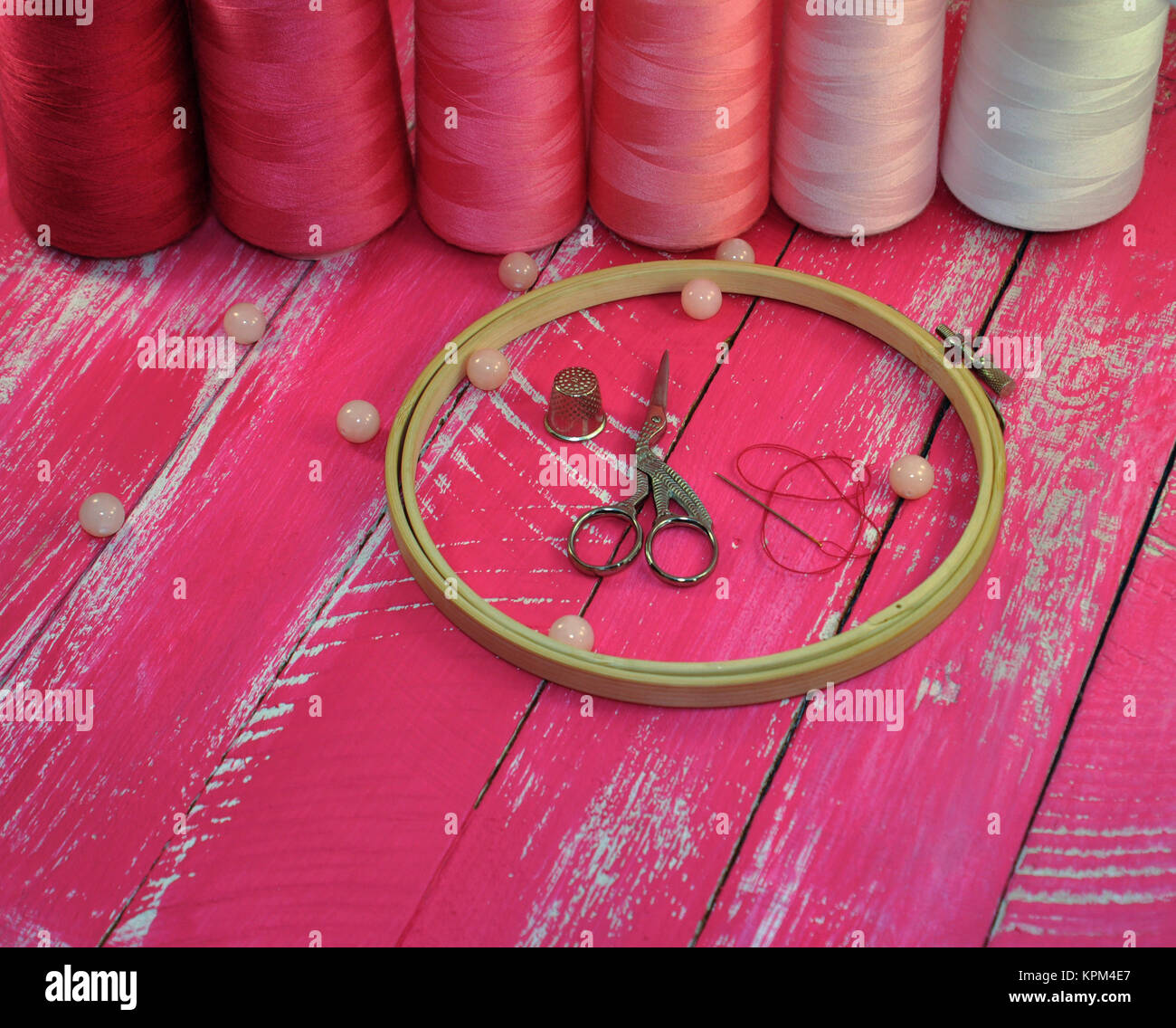 tools for crafts and hobbies on a pink wooden background Stock Photo ...
