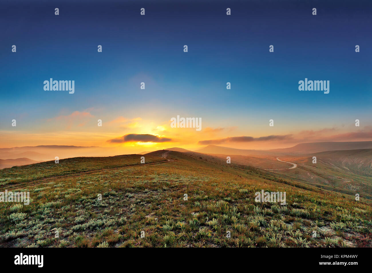 Spring colorful sunset in the hills Stock Photo - Alamy