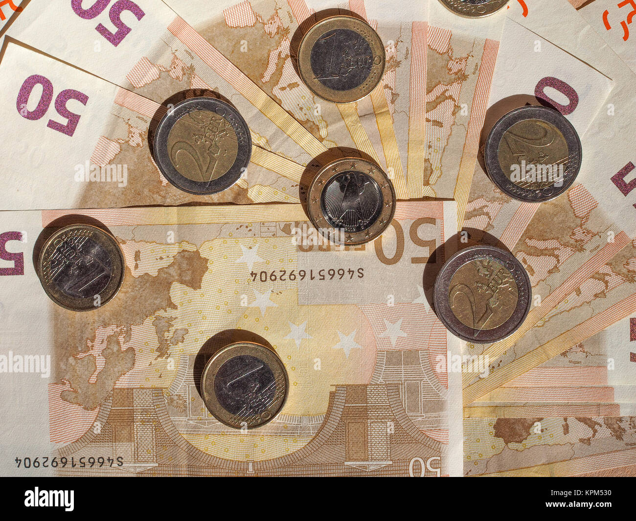 Euro coins and notes Stock Photo - Alamy