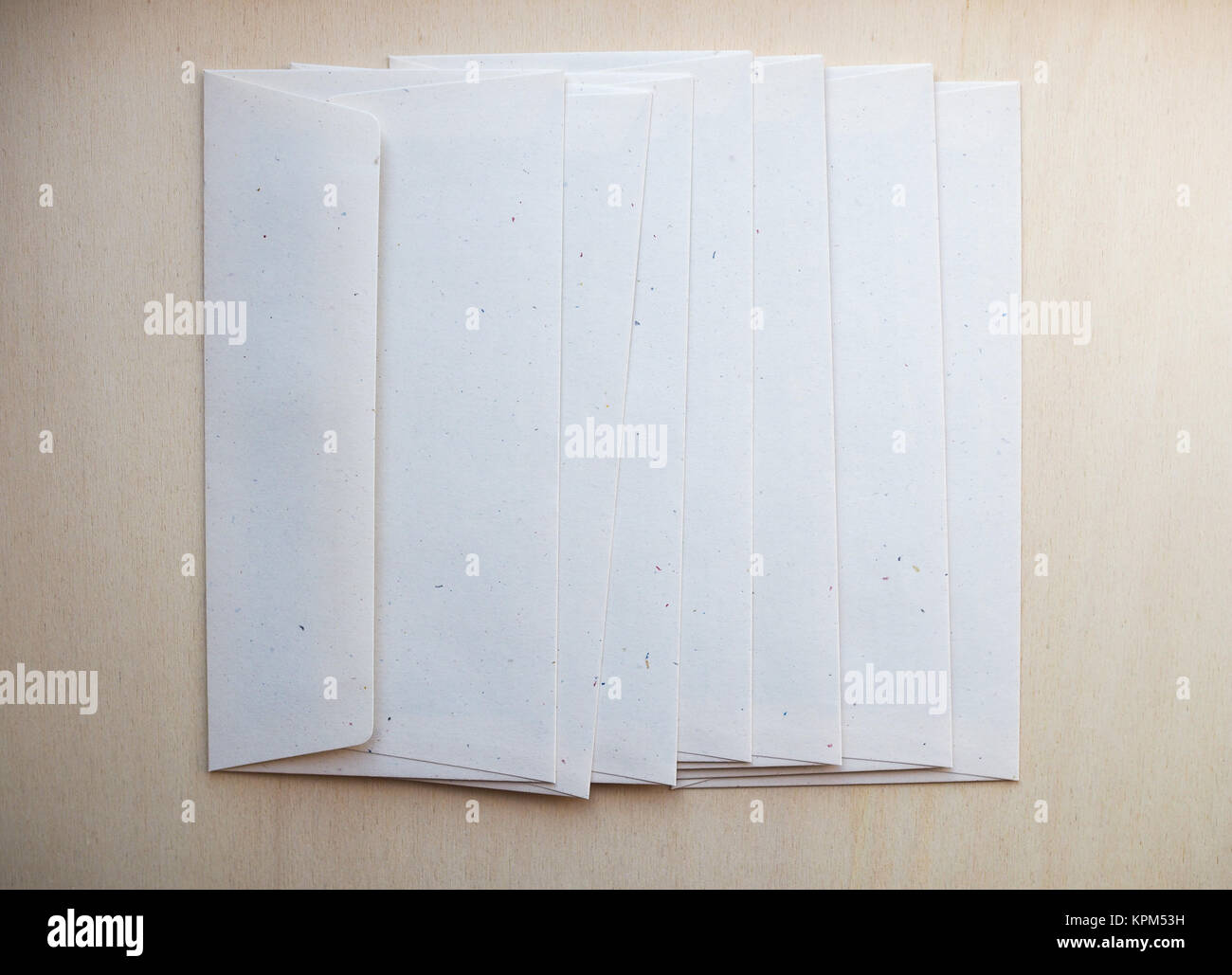 Letter envelope on wood table Stock Photo - Alamy
