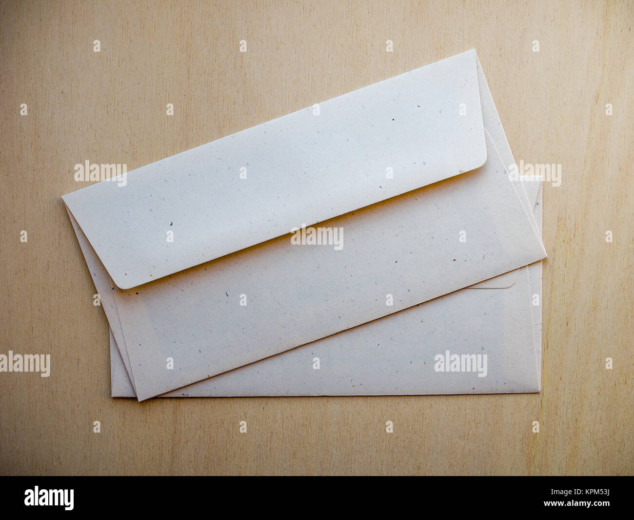 Letter envelope on wood table Stock Photo - Alamy