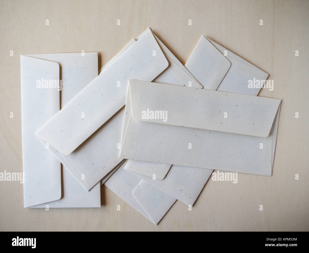 Letter envelope on wood table Stock Photo - Alamy