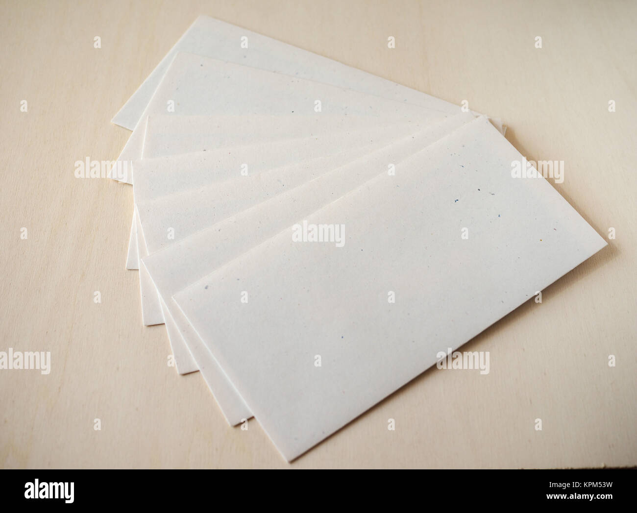 Letter envelope on wood table Stock Photo - Alamy